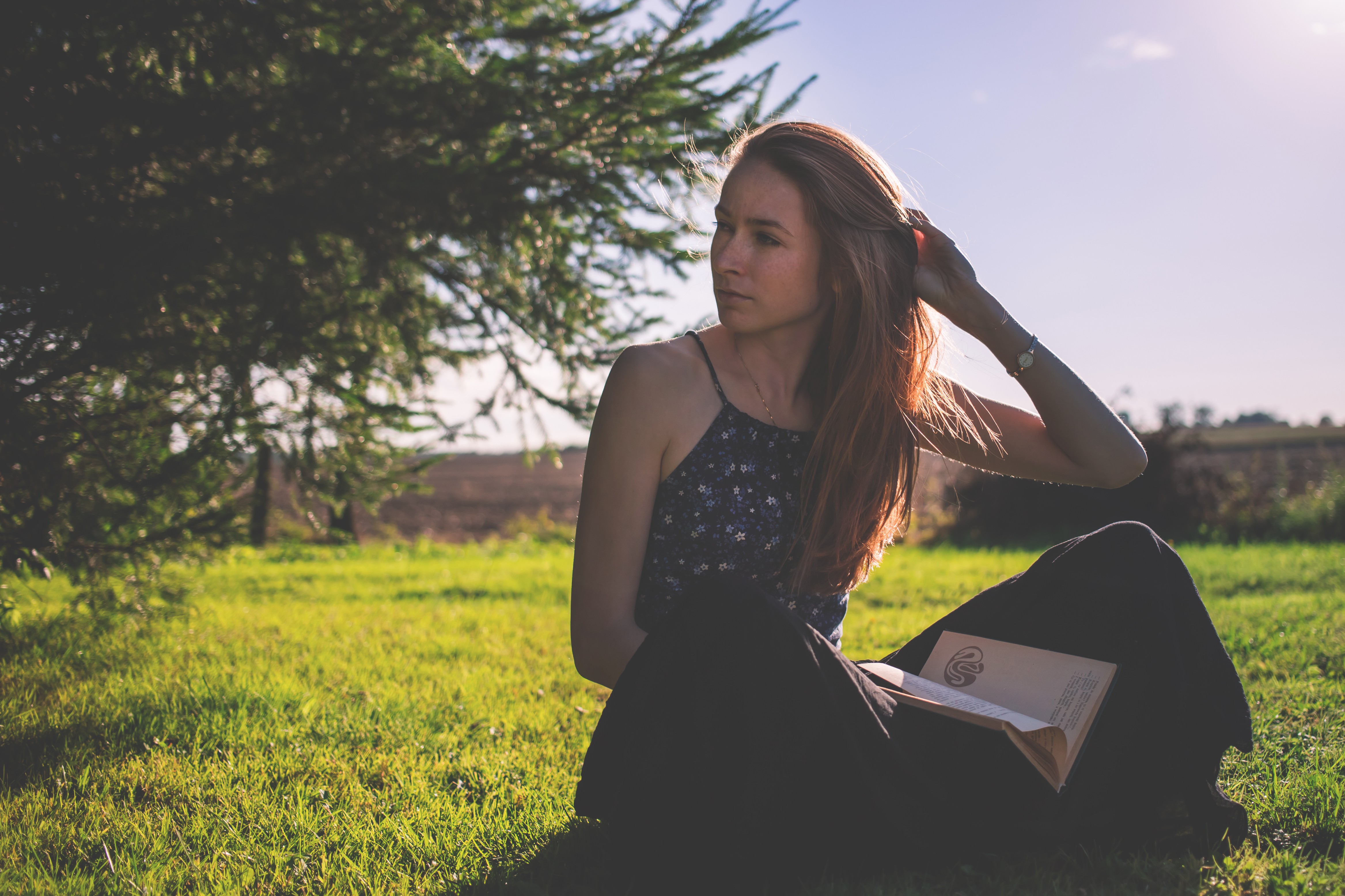Girl sitting on the grass - freestocks.org - Free stock photo